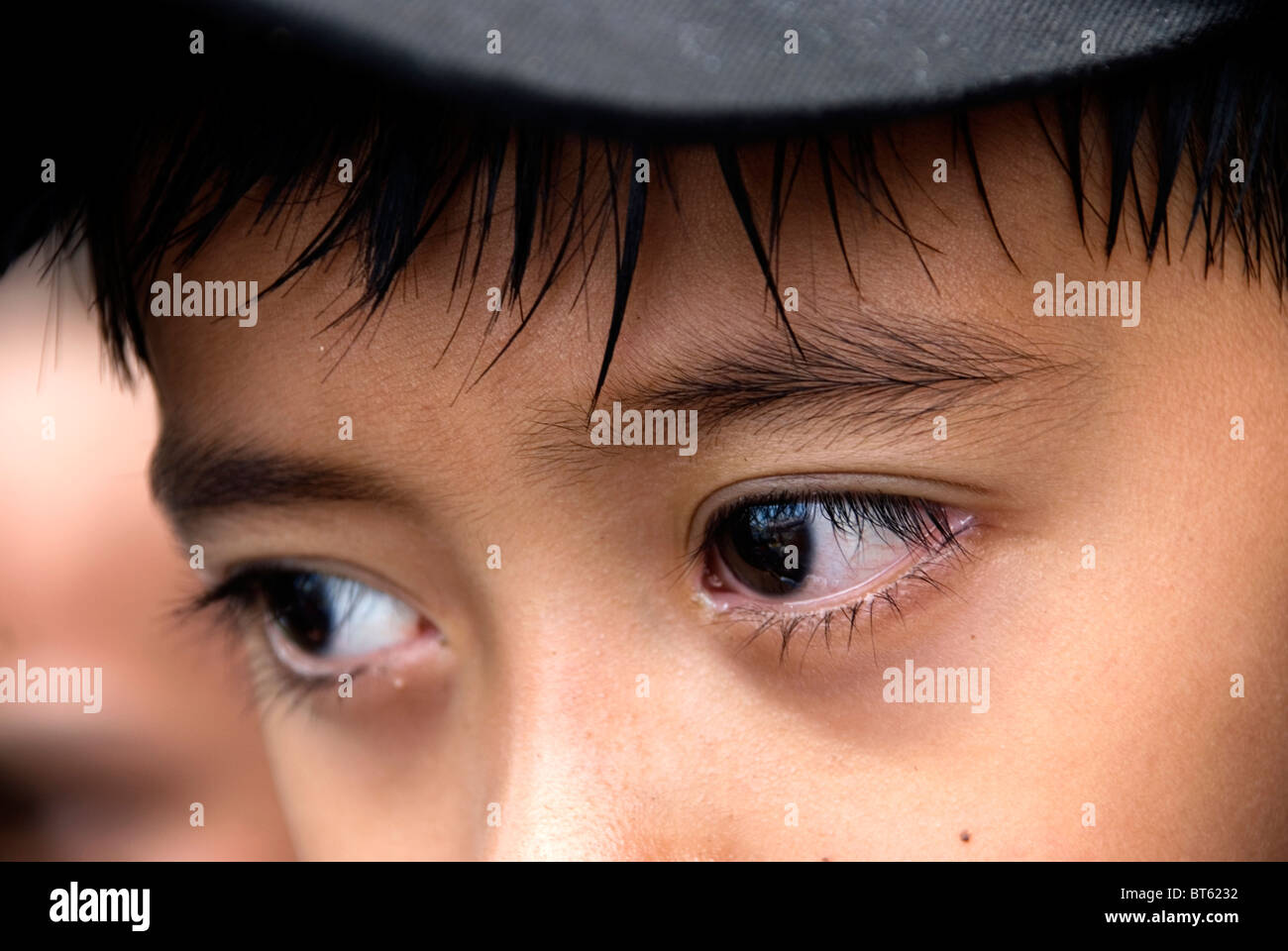 philippines, panay, iloilo, boy's eyes Stock Photo - Alamy