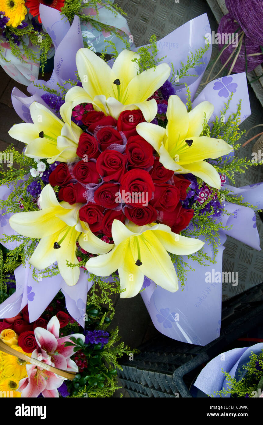 rose roses bunch Rosa Rosaceae lily Stock Photo - Alamy