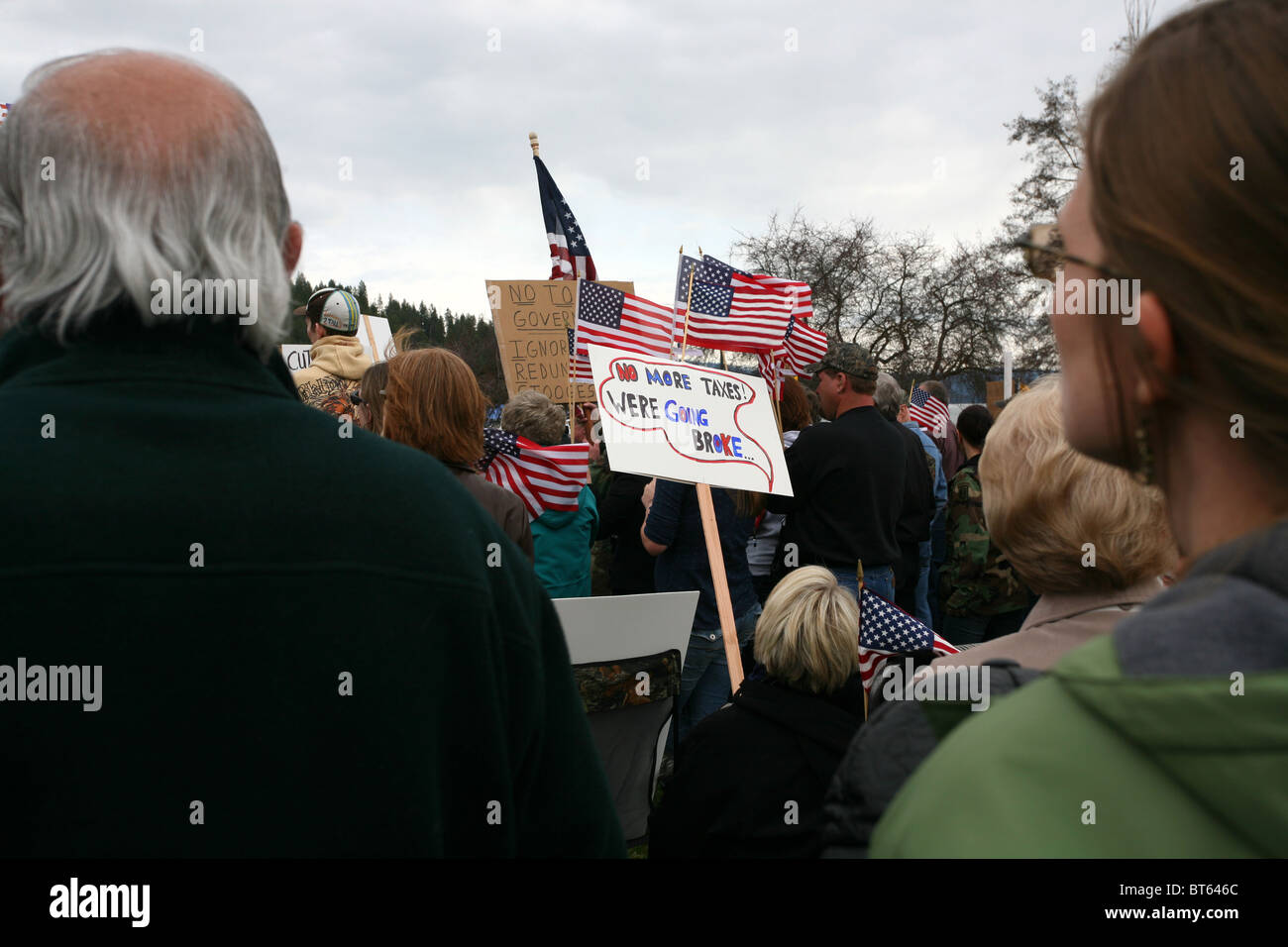 People holding signs and flags, TEA Party rally at Coeur D Alene, Idaho ...