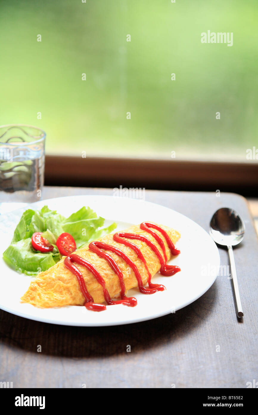 Rice omelette hi-res stock photography and images - Alamy