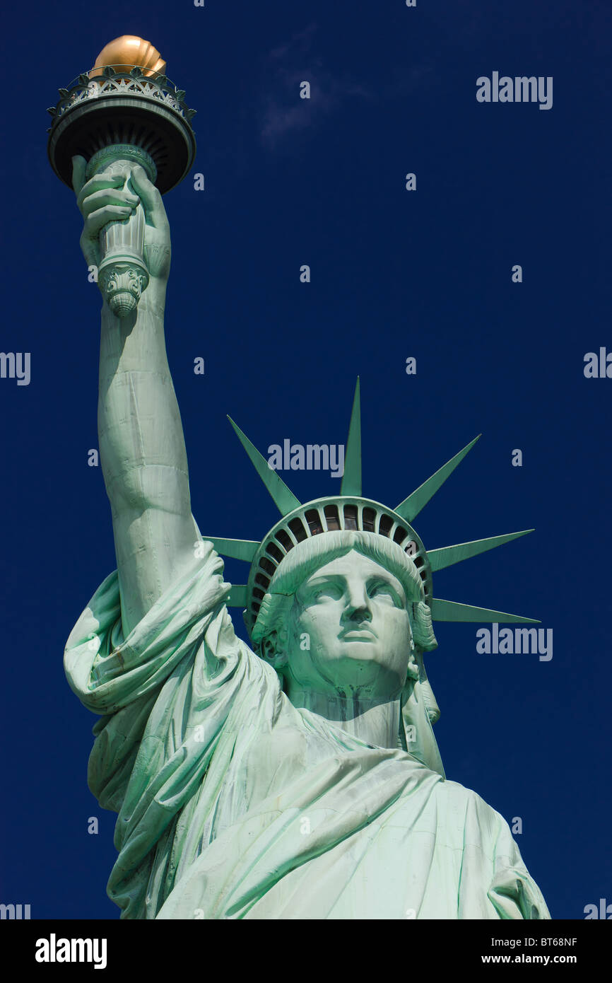 Statue of liberty front view with clear blue sky hi-res stock ...