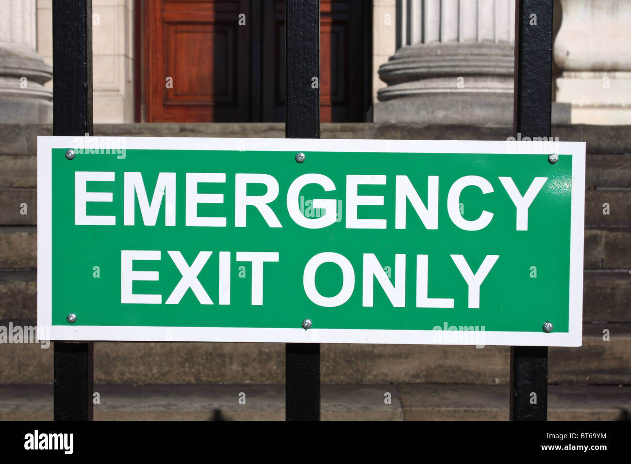 Green emergency exit signs hi-res stock photography and images - Alamy