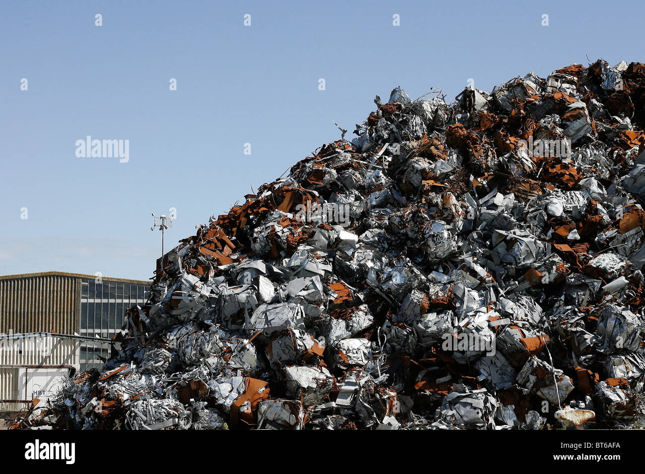 Piles of scrap metal on an industrial estate in Brighton, England Stock ...