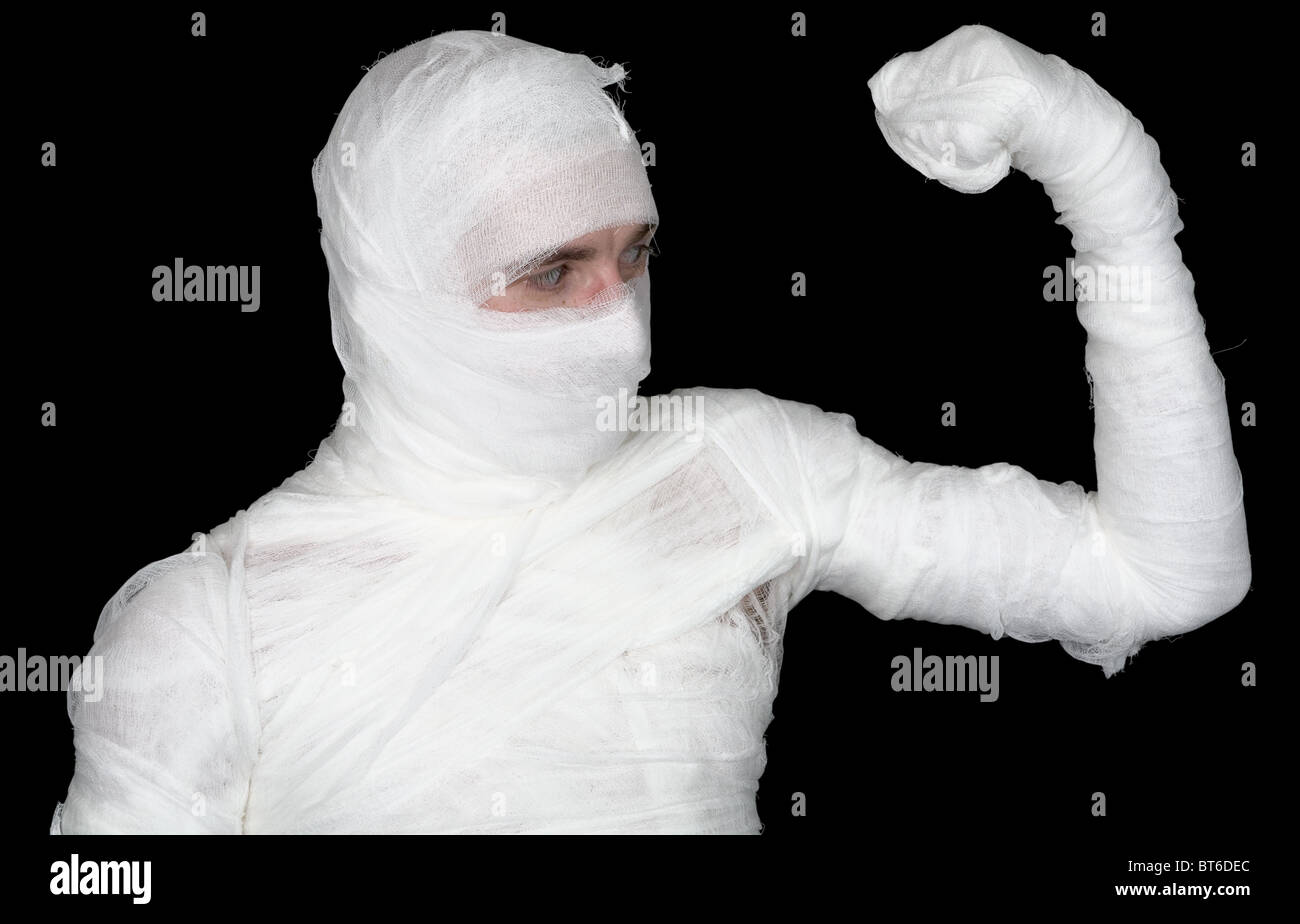 Man in bandage on the black background Stock Photo - Alamy