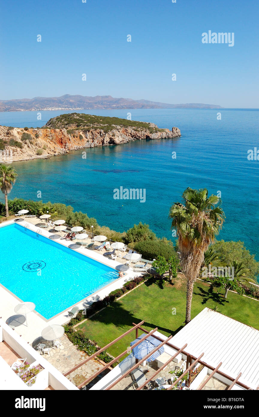 Swimming pool at the beach of luxury hotel, Crete, Greece Stock Photo ...