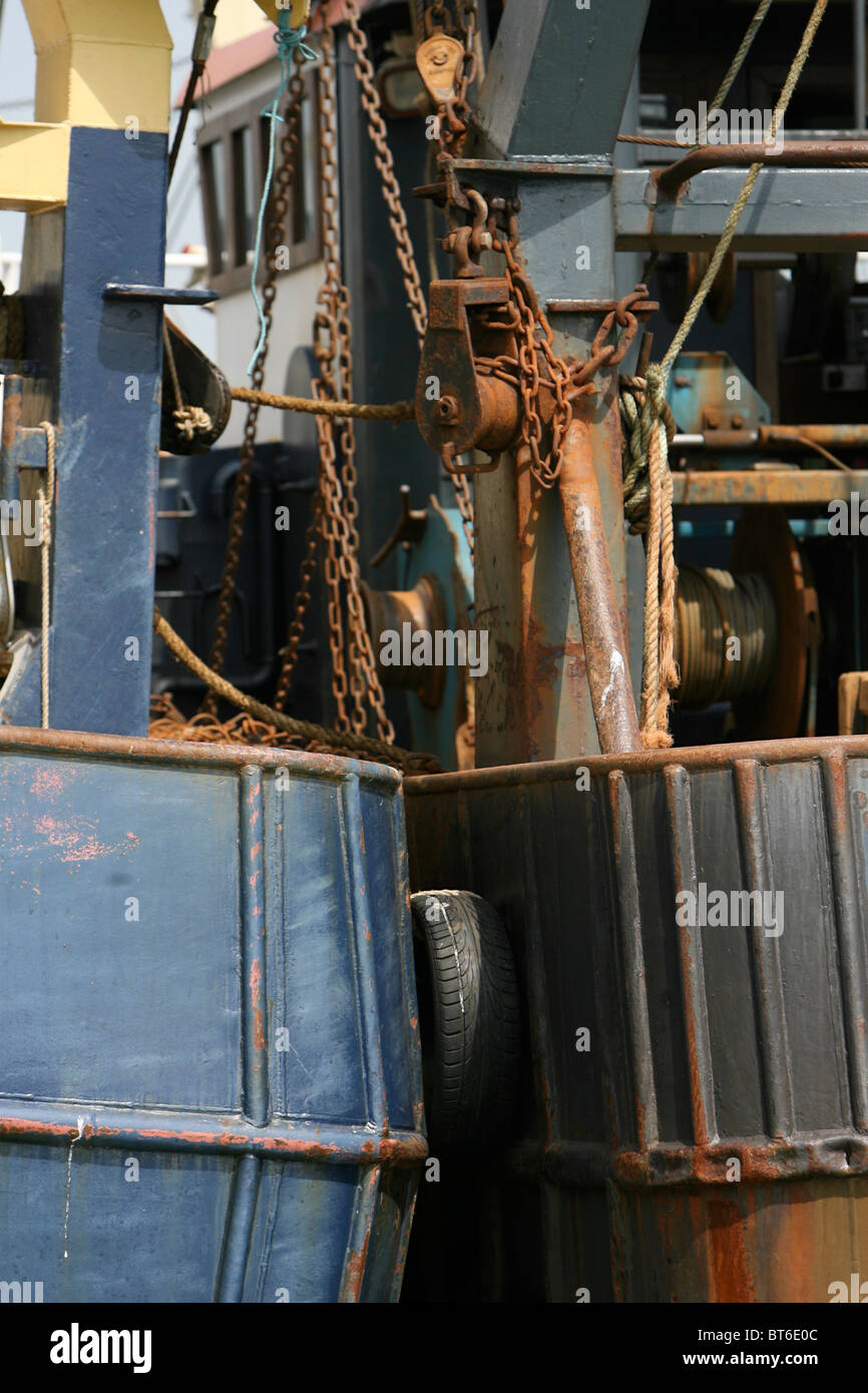 A view of the stern of two fishing boats Stock Photo - Alamy