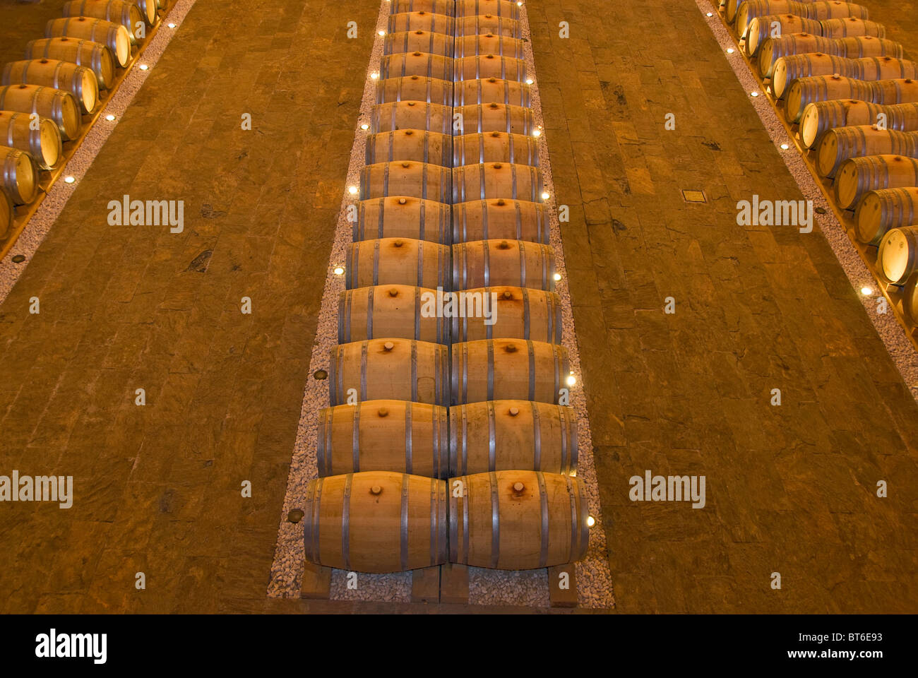 Top view of a row of barrels inside a warehouse Stock Photo - Alamy