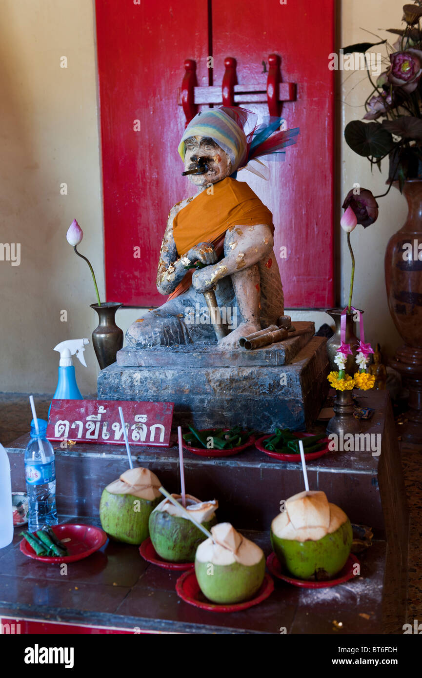 Altar and Statue of a Holy Monk with Offerings in Wat Chalong in Phuket ...