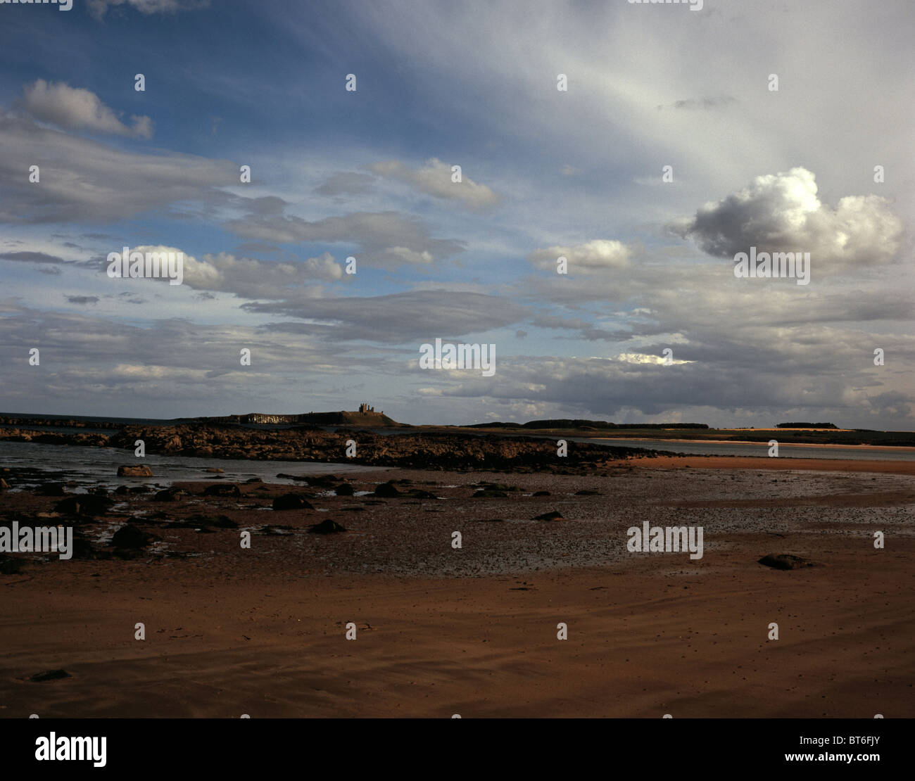 Dunstanburgh Castle from the sandy beach at Embleton Bay Embleton ...