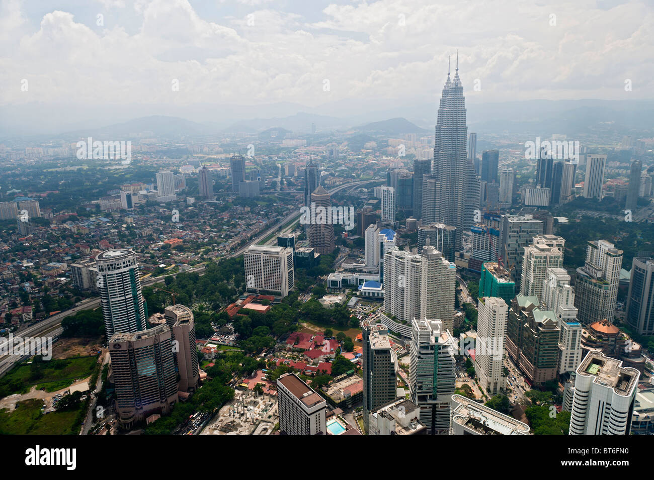 Kuala Lumpur Skyline and Petronas Twin Towers viewed from the KL Tower ...
