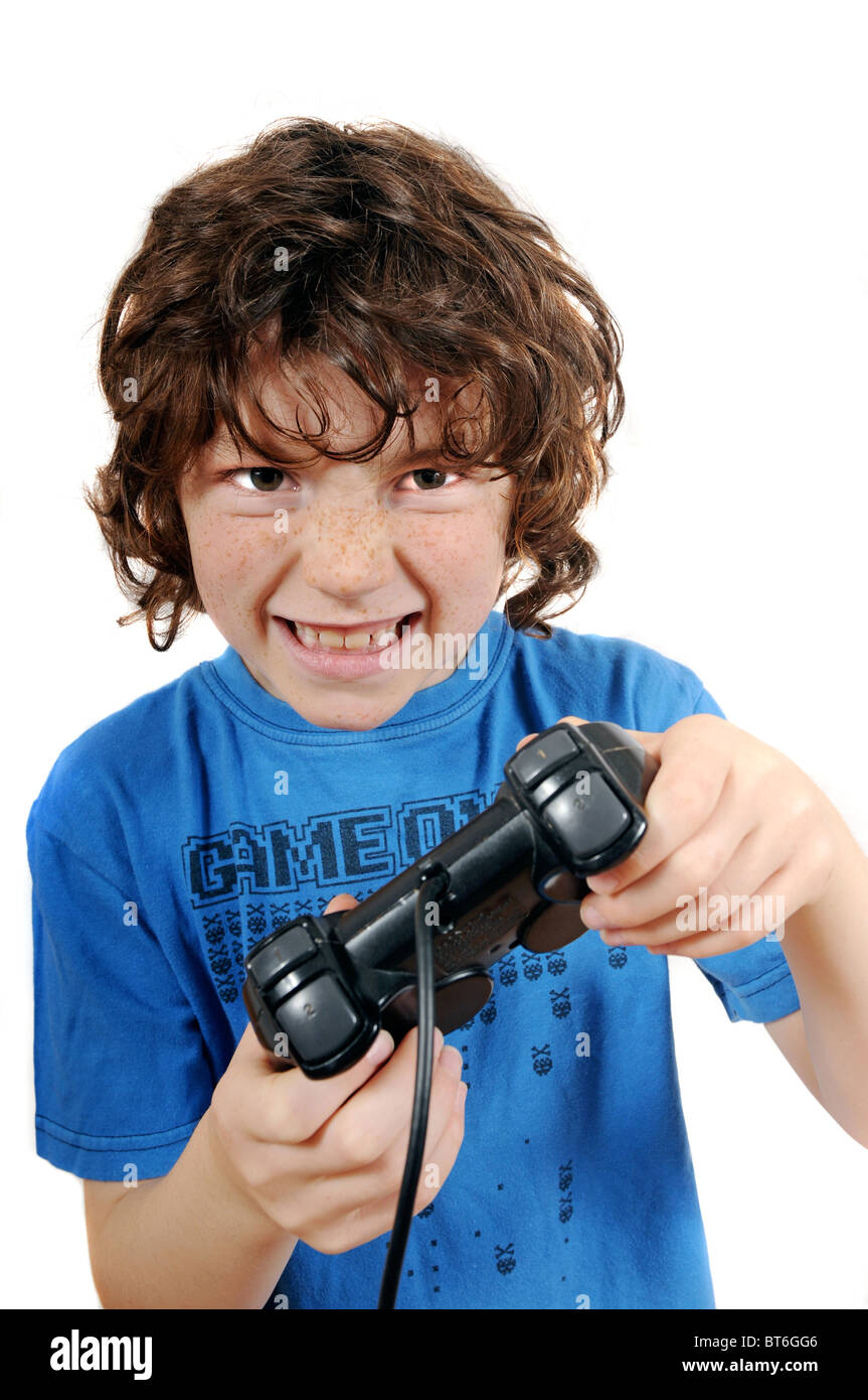 Young boy playing with games controller of console Stock Photo - Alamy