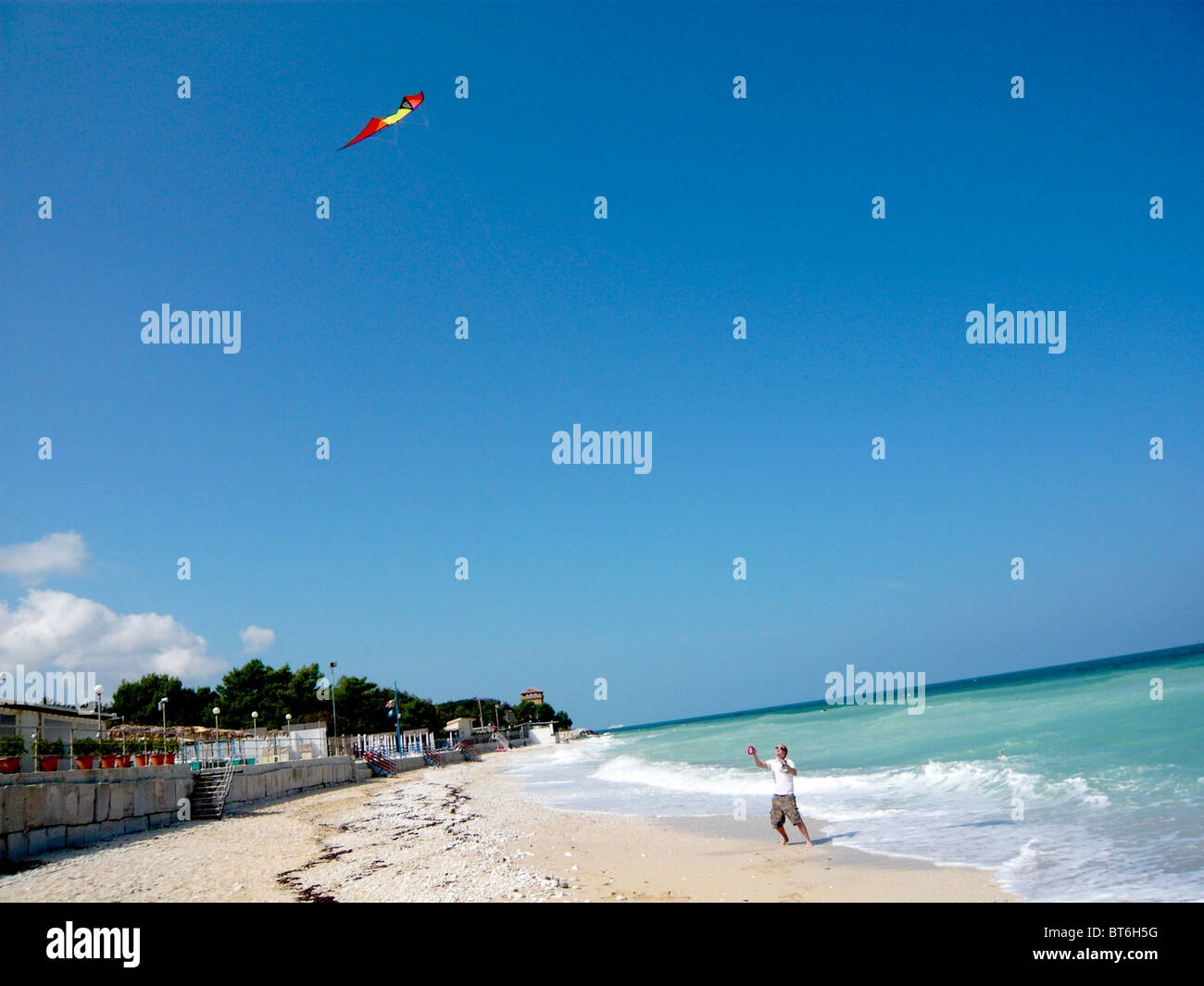 kite on a beach in italy Stock Photo - Alamy