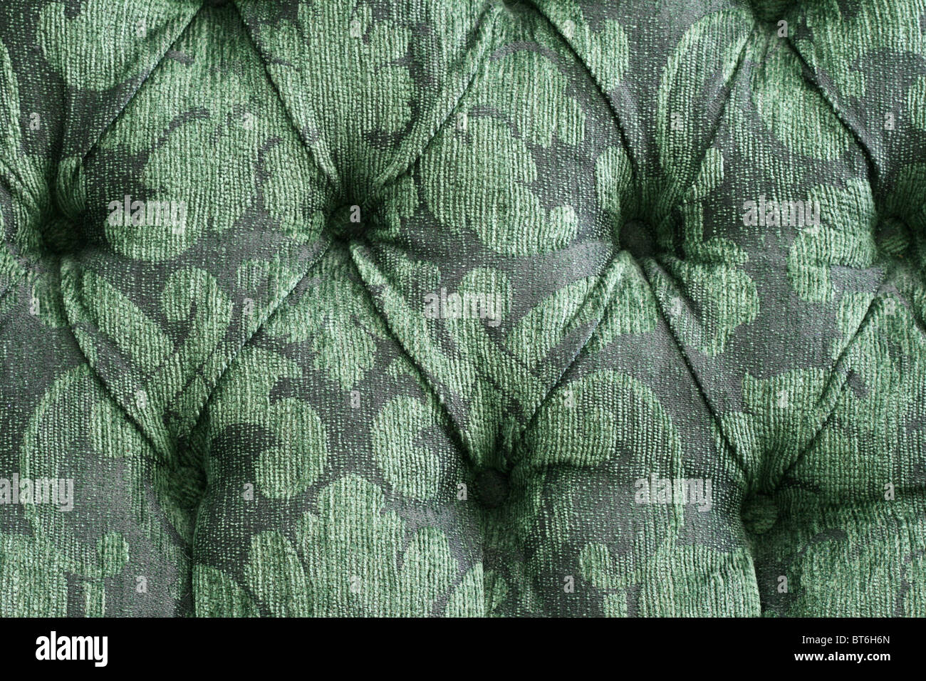 green patterned upholstered furniture detail background Stock Photo - Alamy