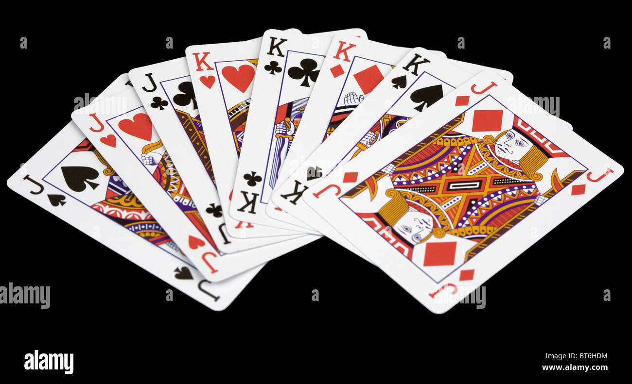 Card jacks and kings on the black background Stock Photo - Alamy