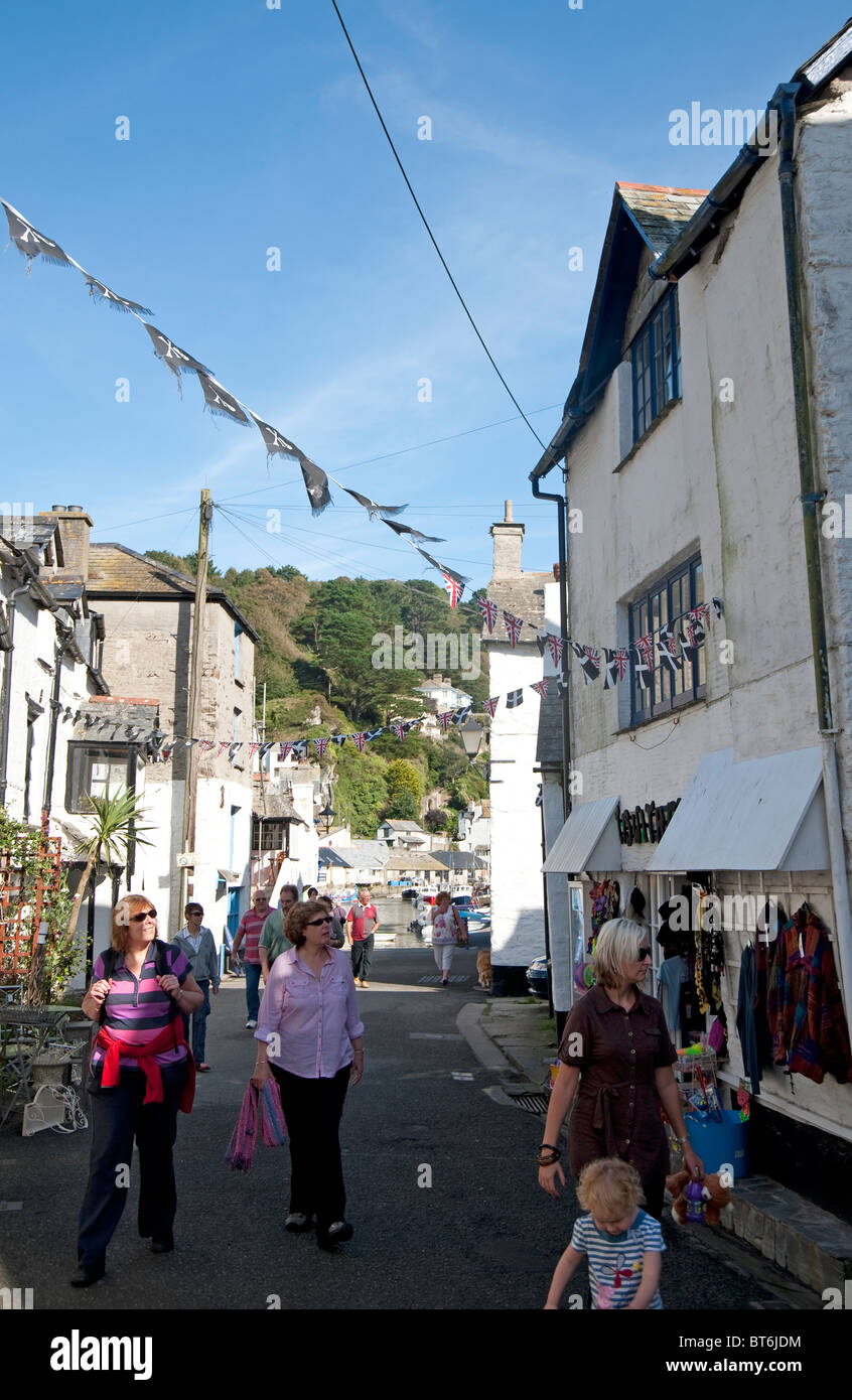 People walking in Narrow Street in Polperro, Cornwall, UK Stock Photo ...