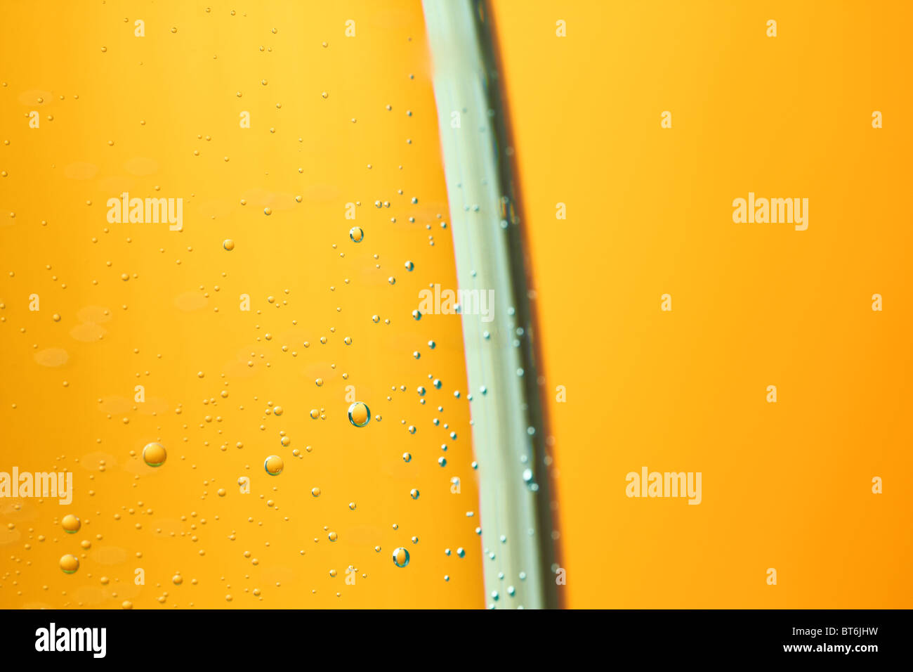 Mineral water air bubbles orange background abstraction Stock Photo - Alamy