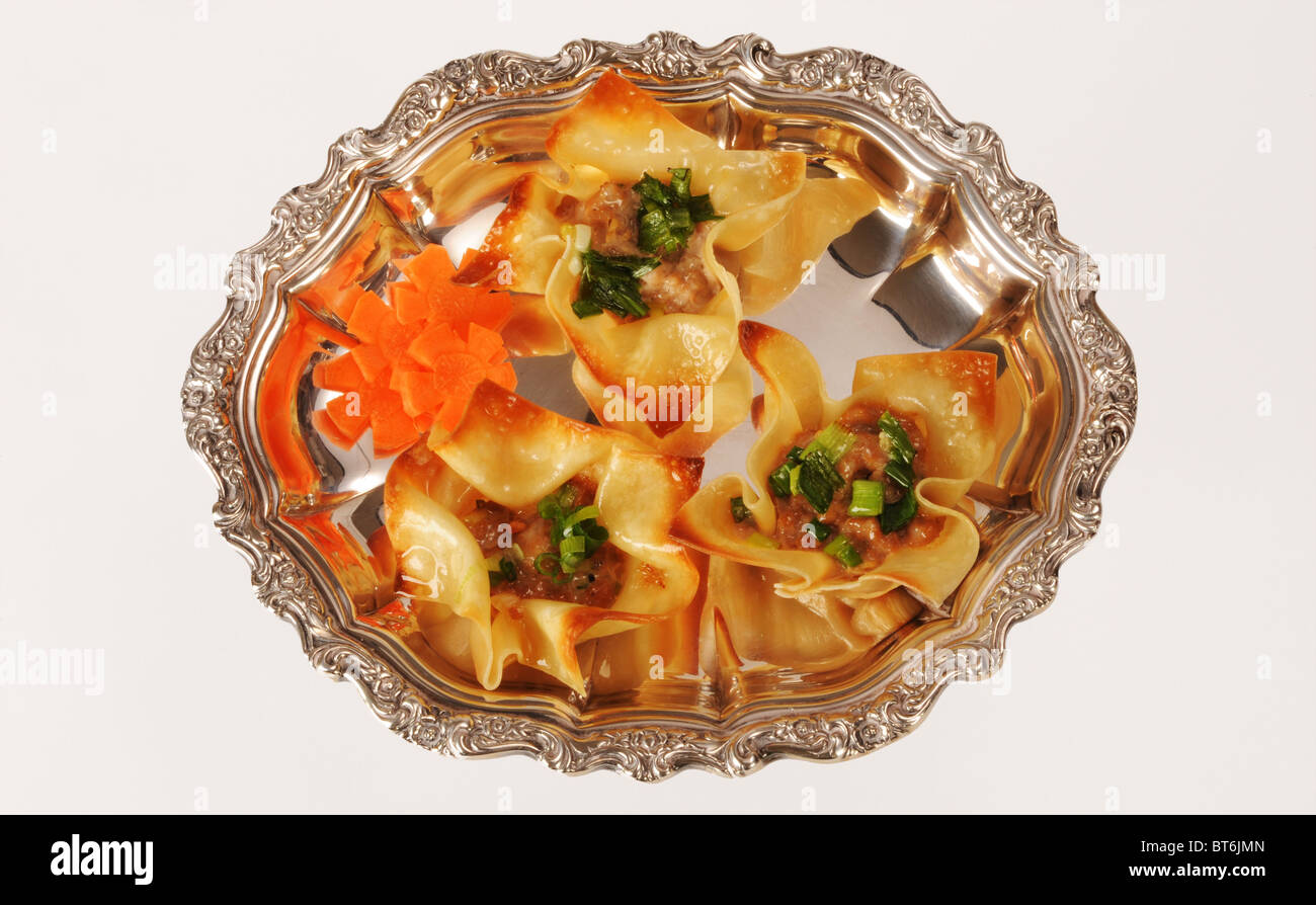 Chinese fryed Wantons on a silver platter Stock Photo - Alamy