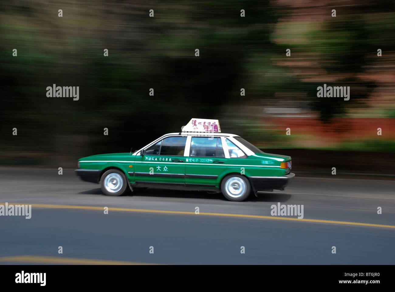 Taxi at speed Stock Photo - Alamy