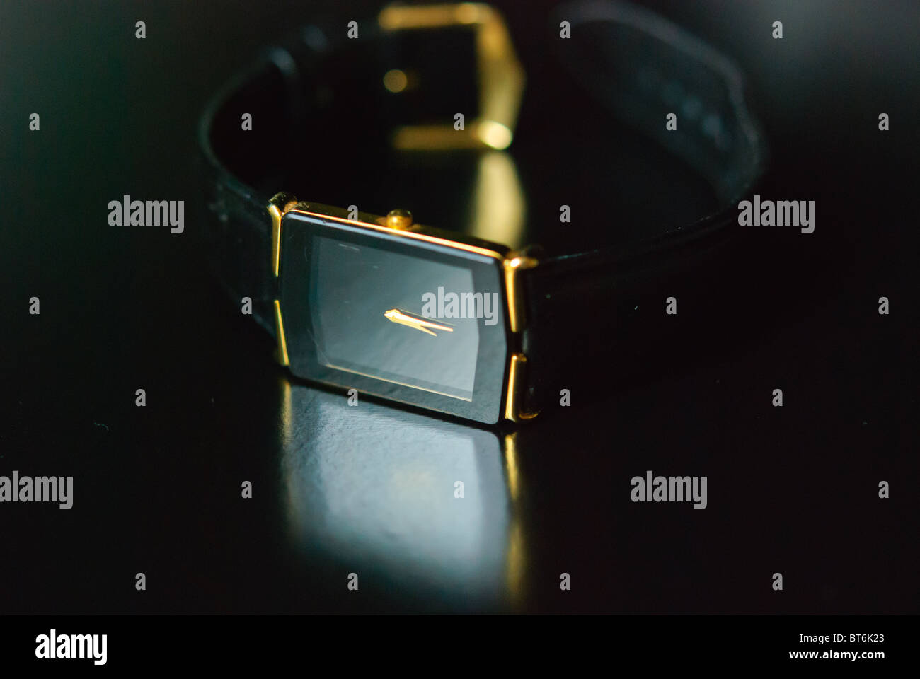 Still life: wrist watch and its reflection Stock Photo - Alamy