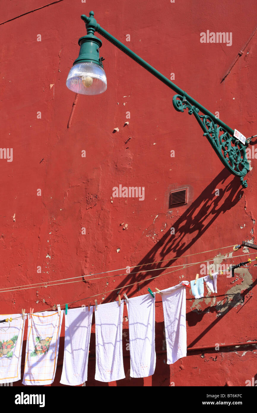 red wall in Venice, Italy Stock Photo - Alamy