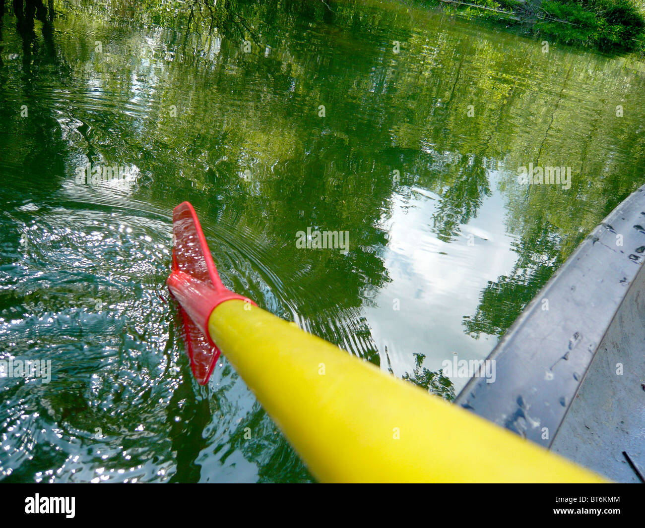 boat on a gentle stream Stock Photo - Alamy