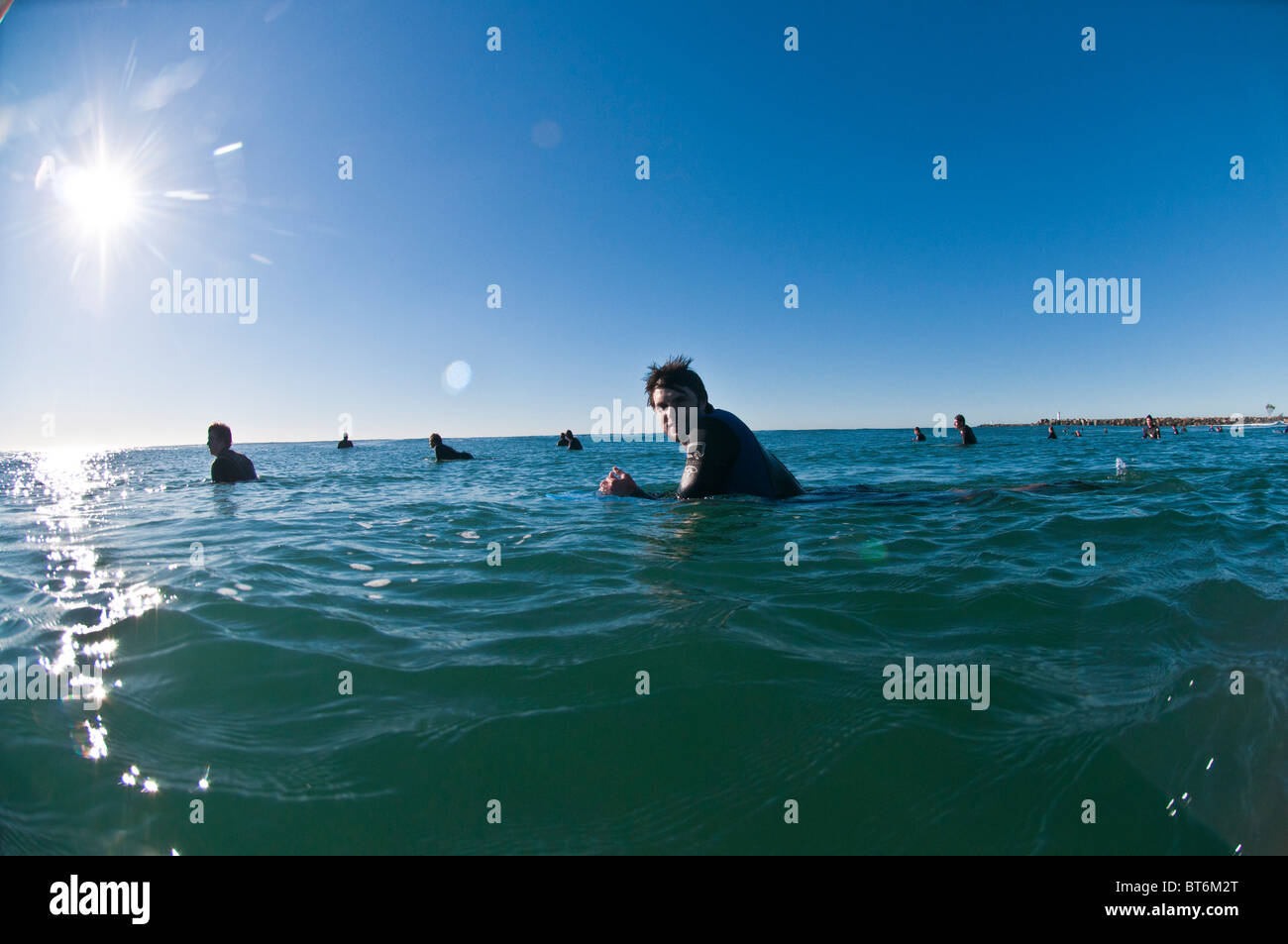 Bodyboarders in the surf lineup, South Stradbroke Island, Gold Coast ...