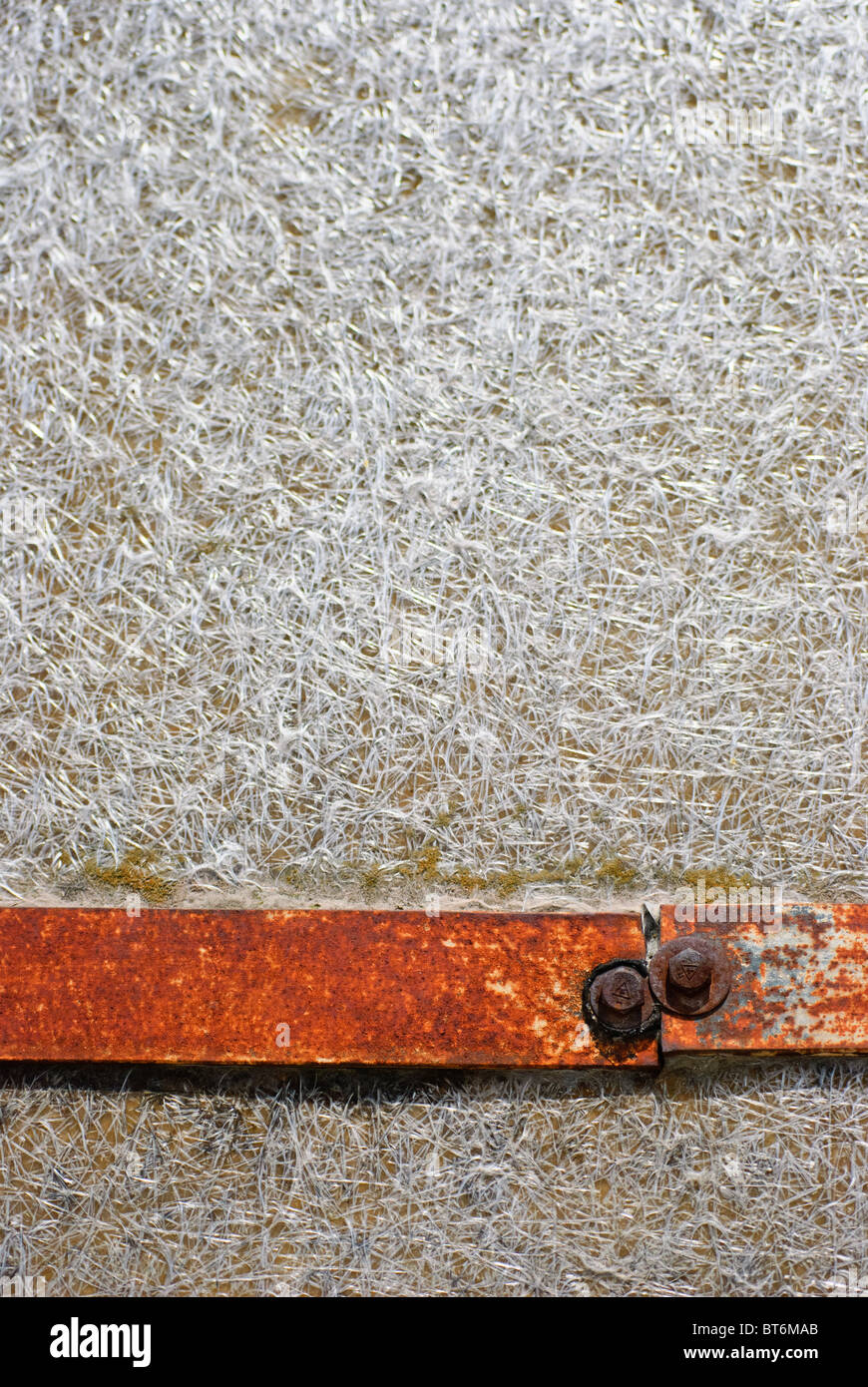 Fiberglass panels are seen joined with rusty metal fasteners Stock ...