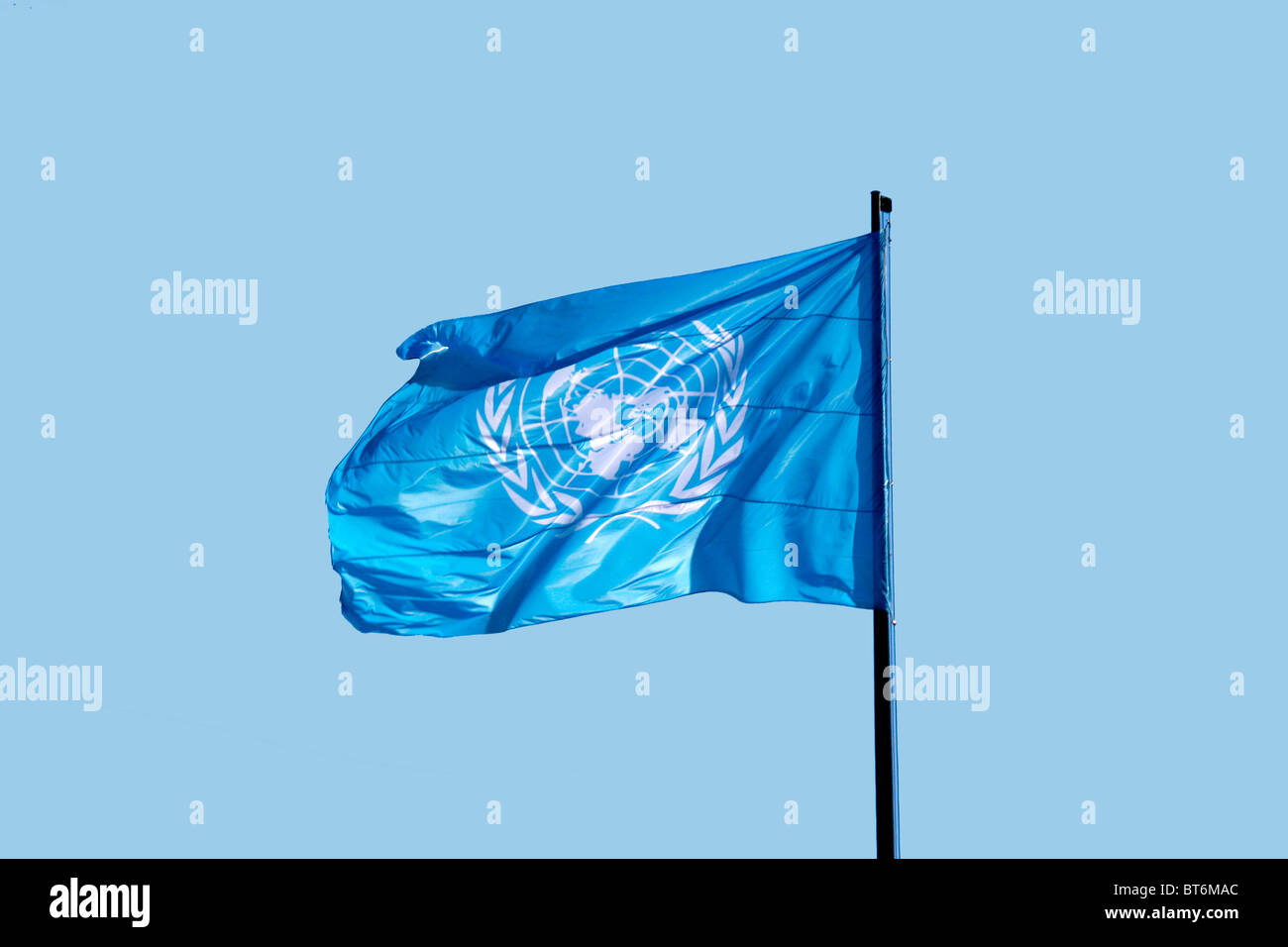 Flag of the United Nations against blue sky Stock Photo - Alamy
