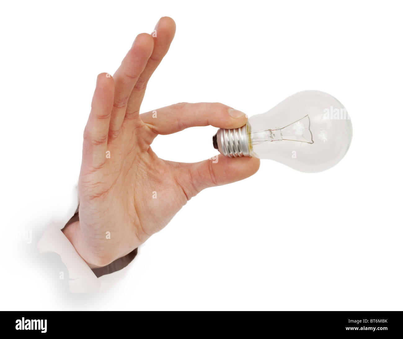 Male hand holding bulb photographed on a white background Stock Photo ...