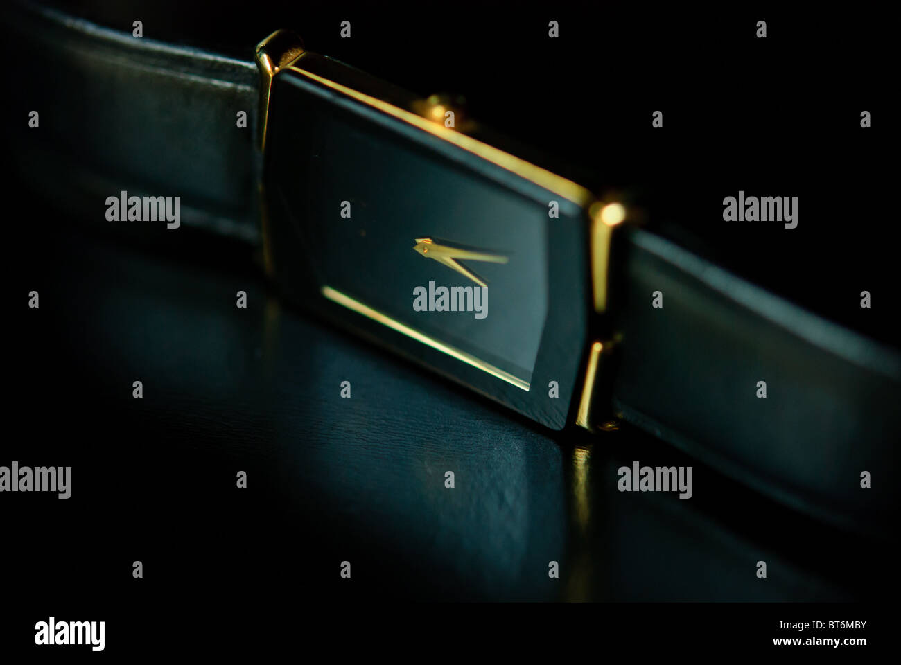 Still life: wrist watch and its reflection Stock Photo - Alamy