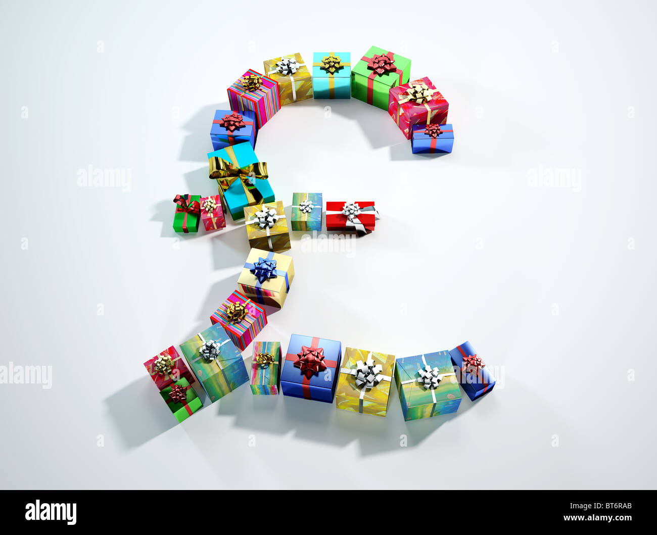 christmas gifts, disposed as the british pound currency sign shape ...
