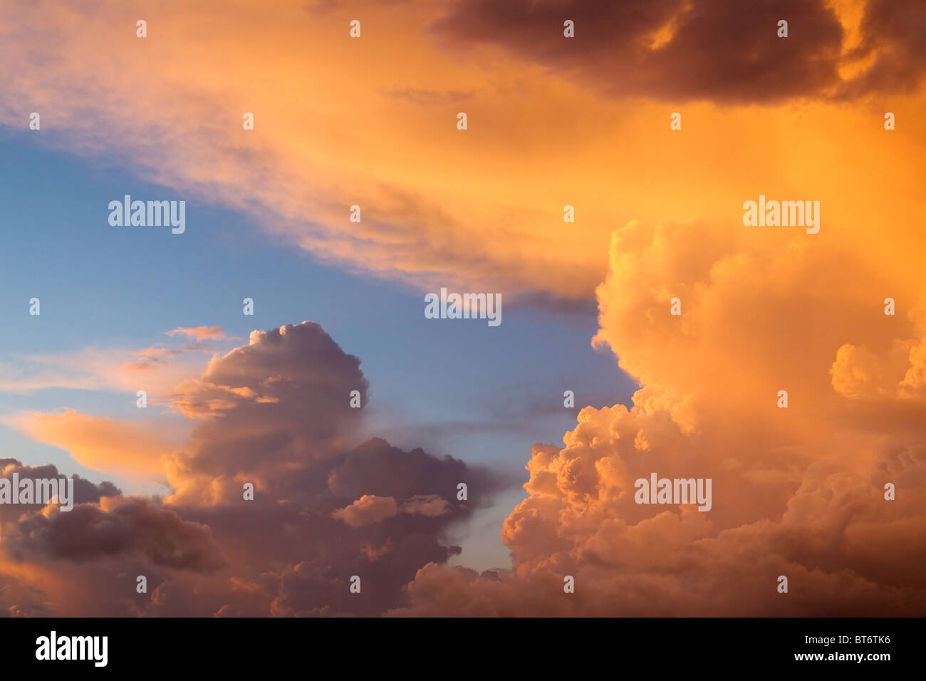 Golden clouds on the sunset sky Stock Photo - Alamy