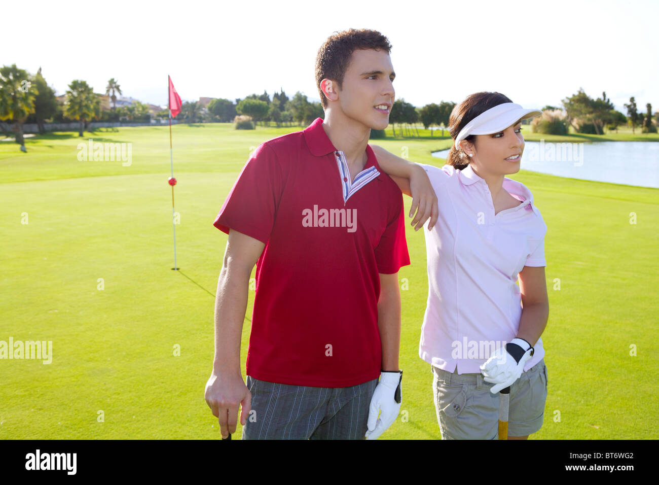 Woman posing on golf course hi-res stock photography and images - Alamy