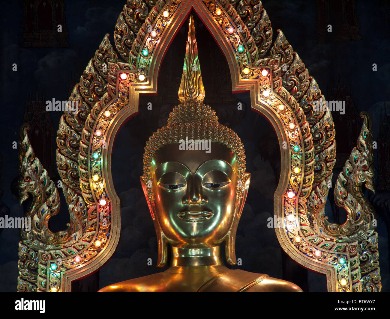 Buddha with coloured lights Stock Photo - Alamy