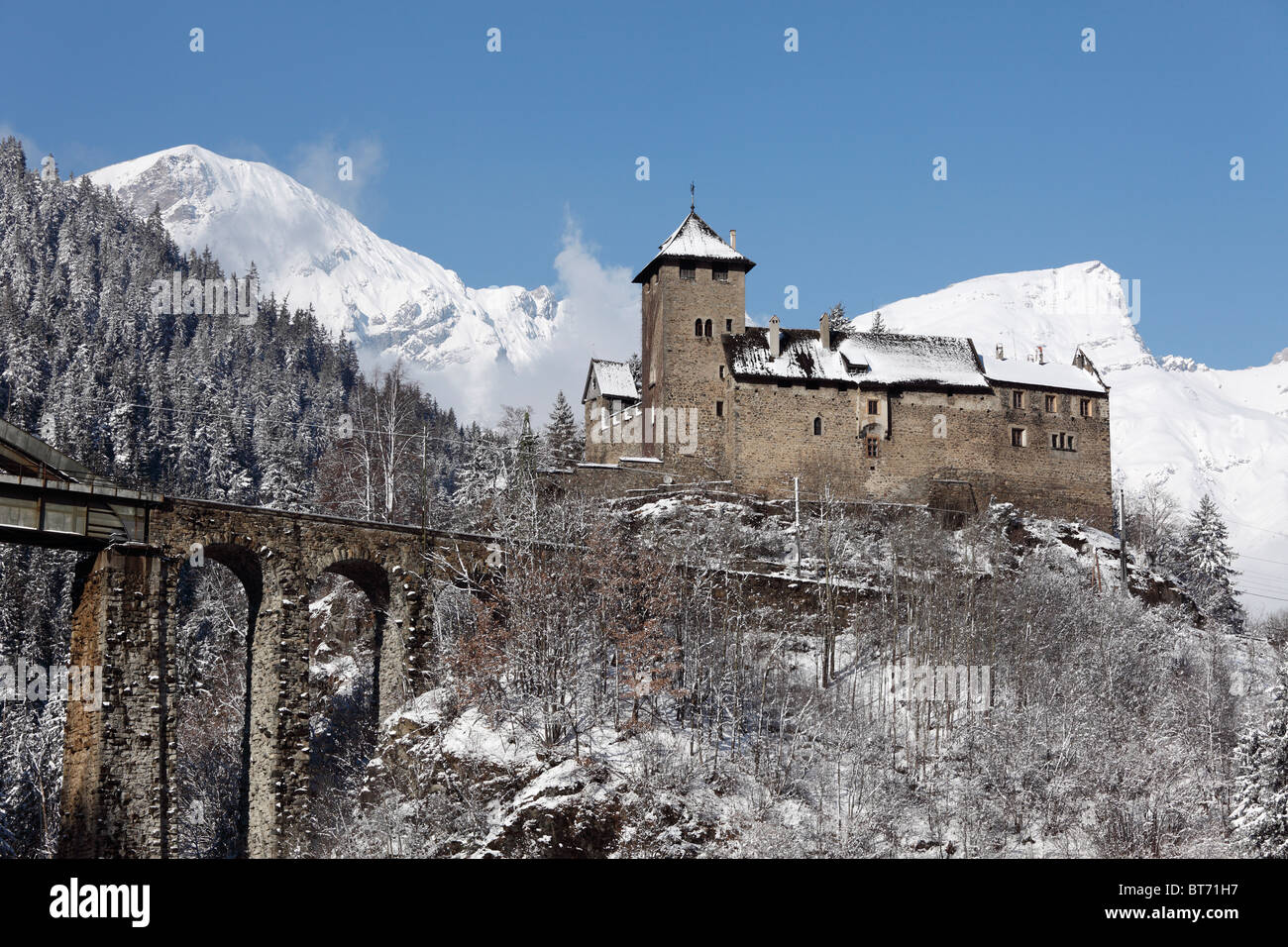 Schloss Wiesberg Castle with bridge over the Trisanna river, Paznautal ...