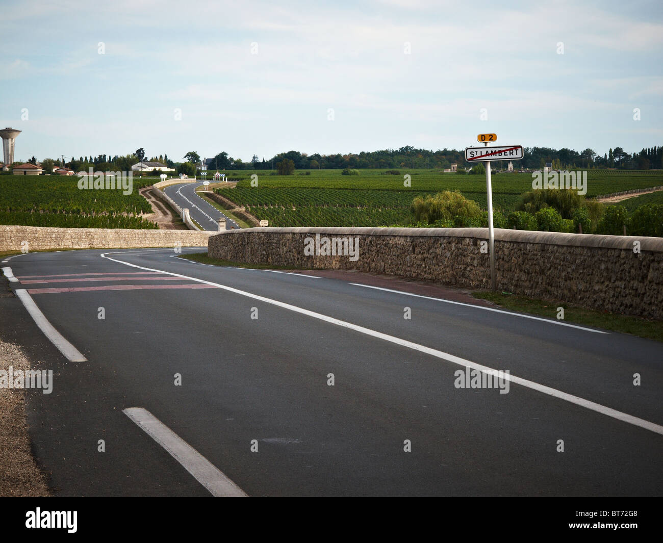French countryside along a bending road Stock Photo - Alamy