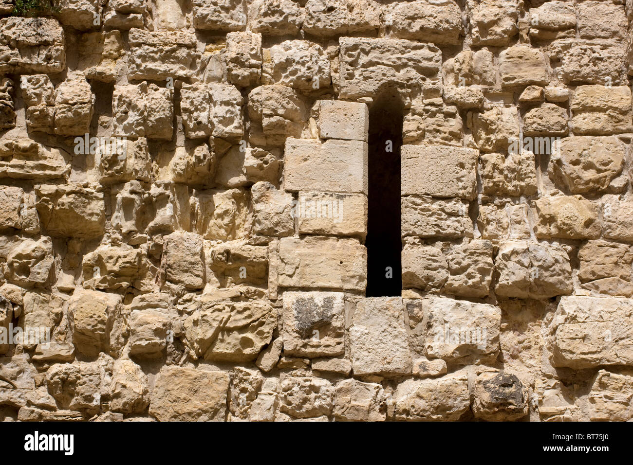 Ancient Stone wall with loophole Stock Photo - Alamy