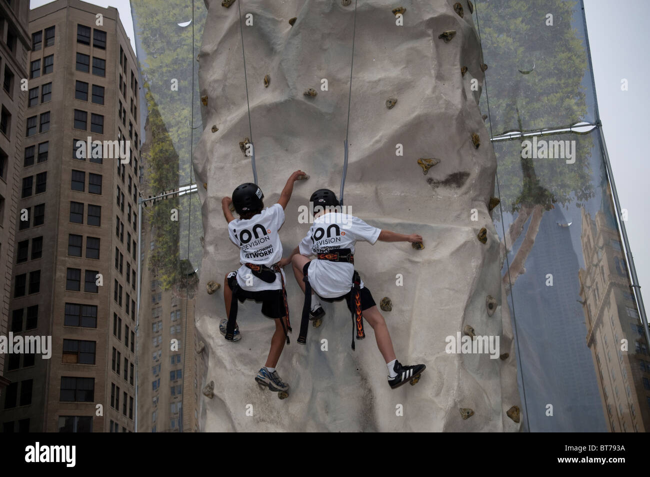 Students rock climb to raise money for their school's physical fitness ...