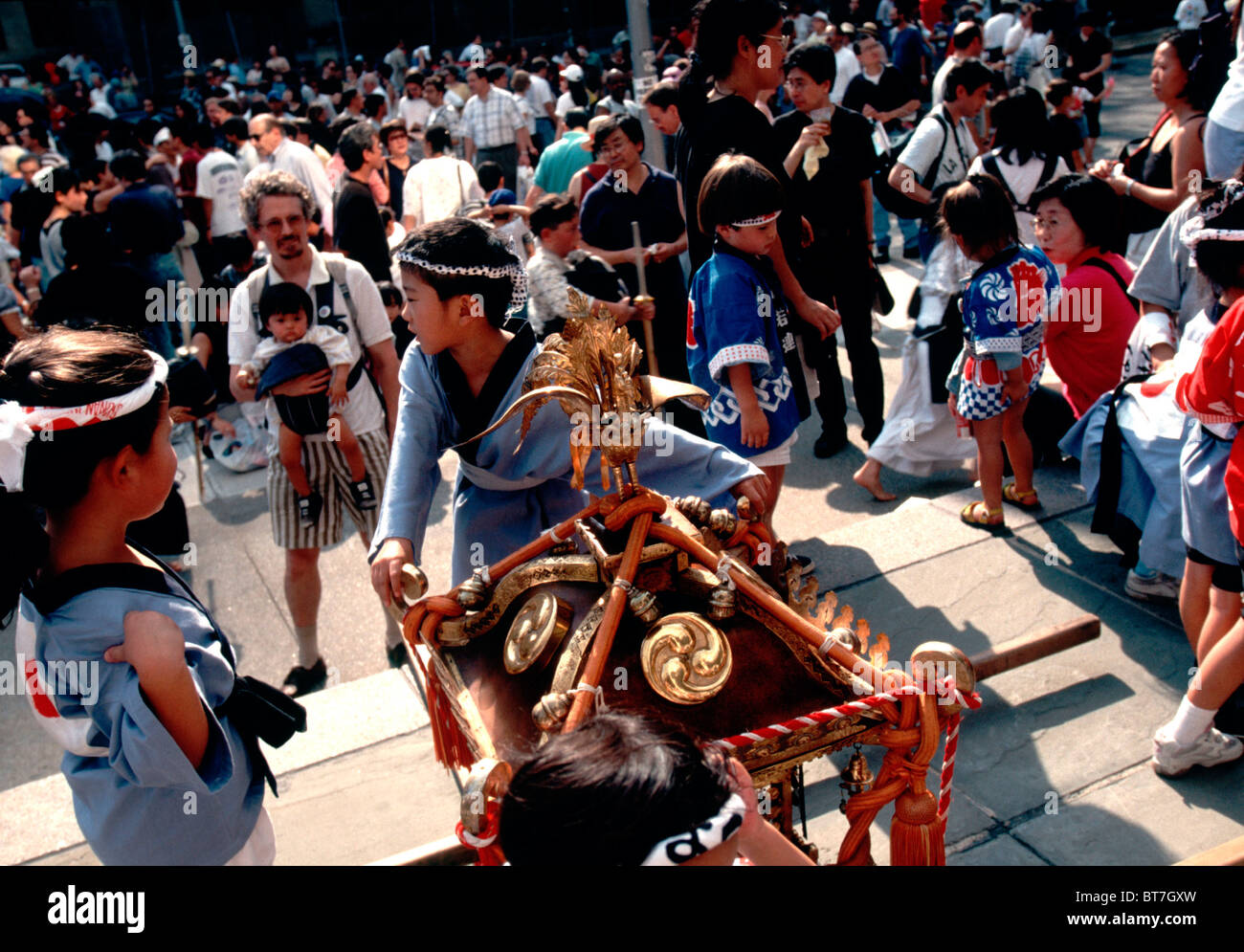 Japanese-Americans with friends and supporters prepare a shrine for a ...