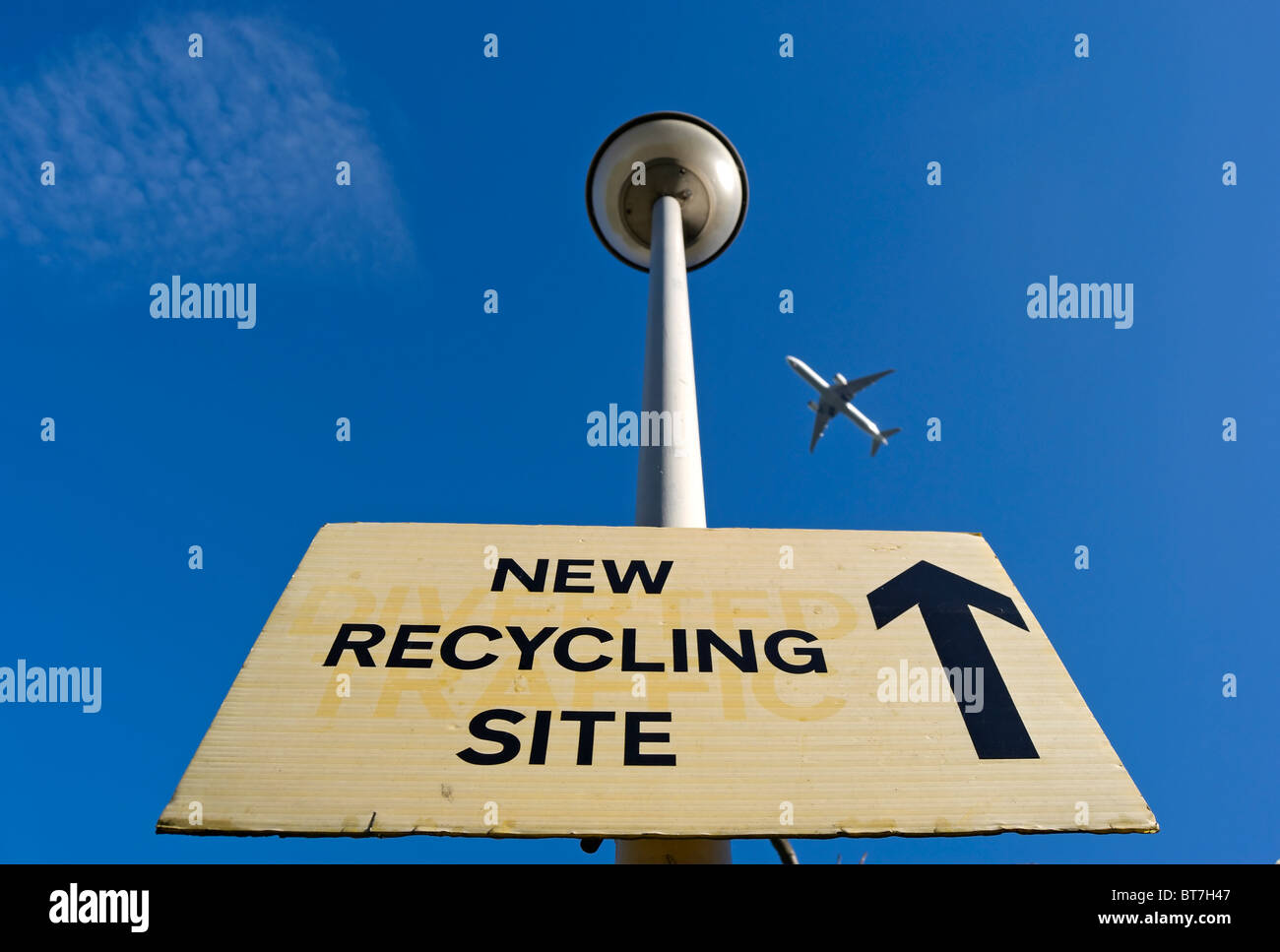 council sign for a new recycling site with plane passing overhead Stock ...
