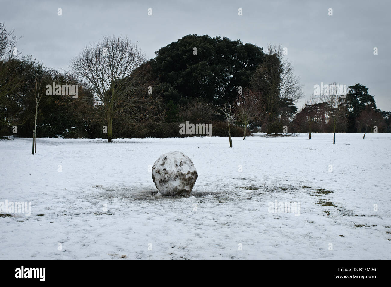 Large snow ball in a public park Stock Photo - Alamy