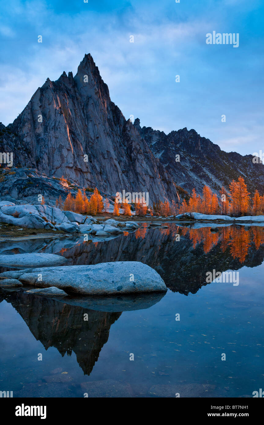 Prusik Peak, Gnome Tarn and alpine larch trees at sunrise; The ...