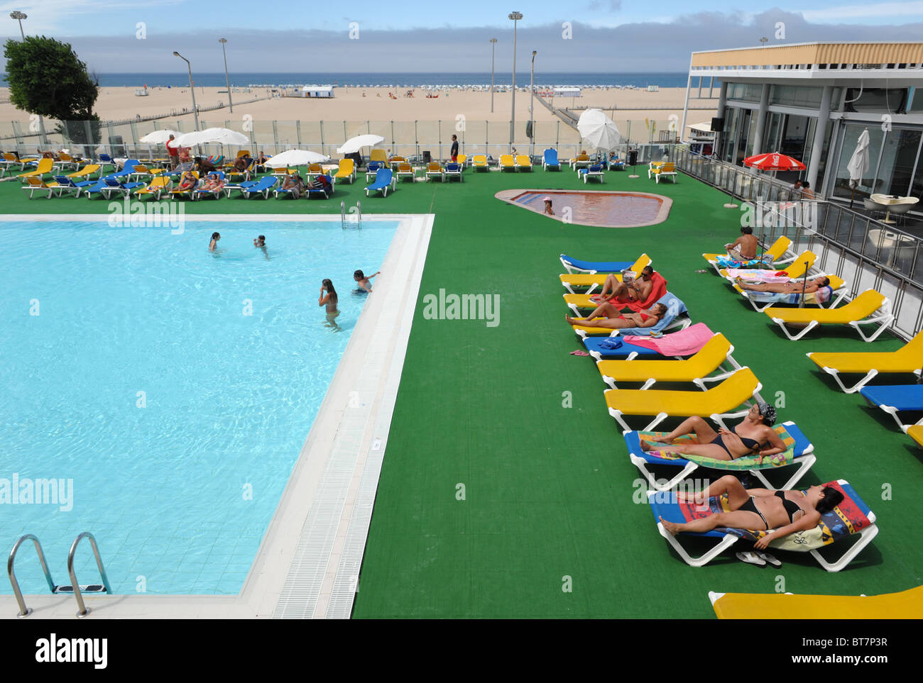 Sunbathing in pool High Resolution Stock Photography and Images - Alamy