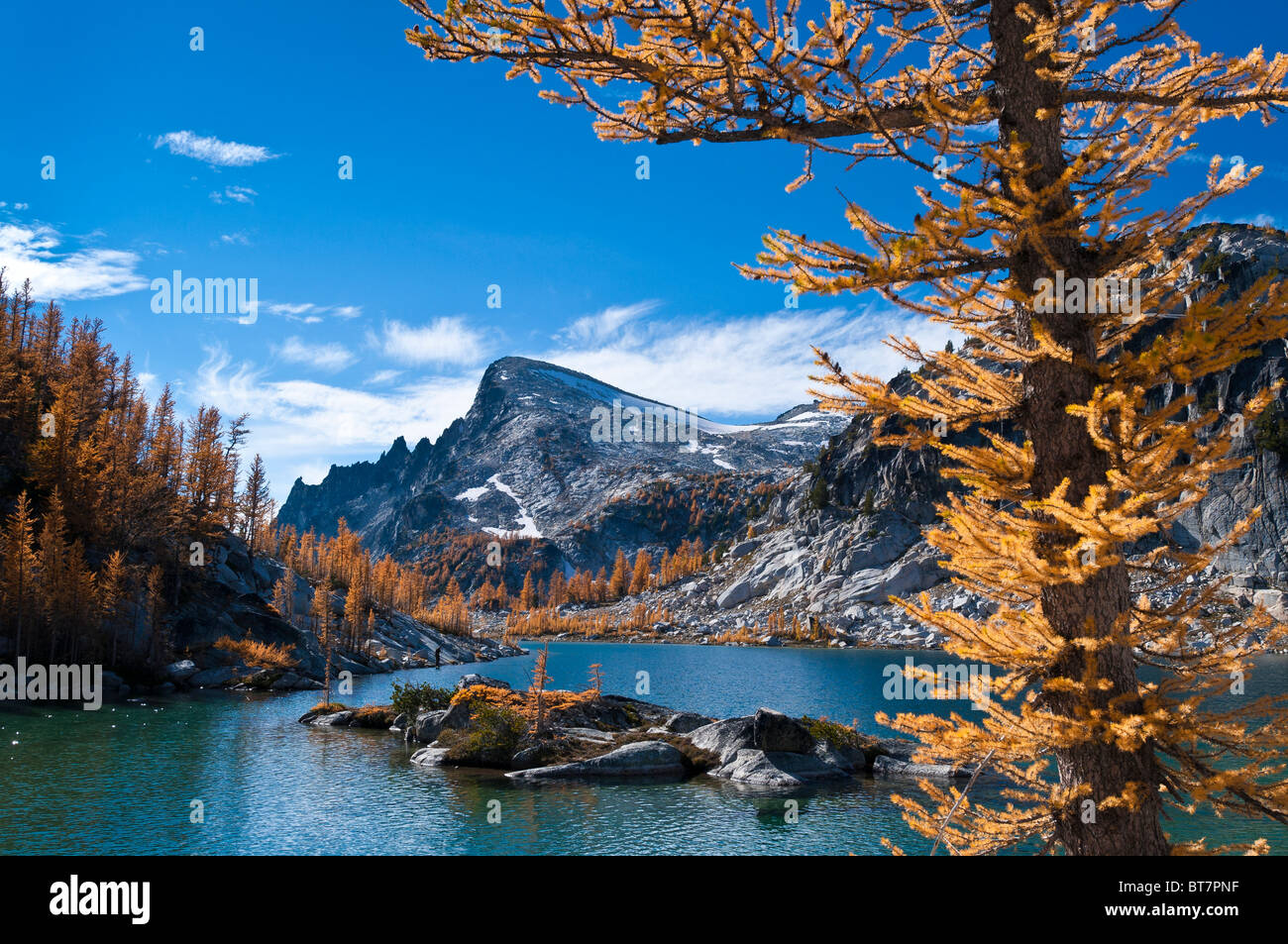 Perfection Lake and Little Annapurna mountain with alpine larch trees ...