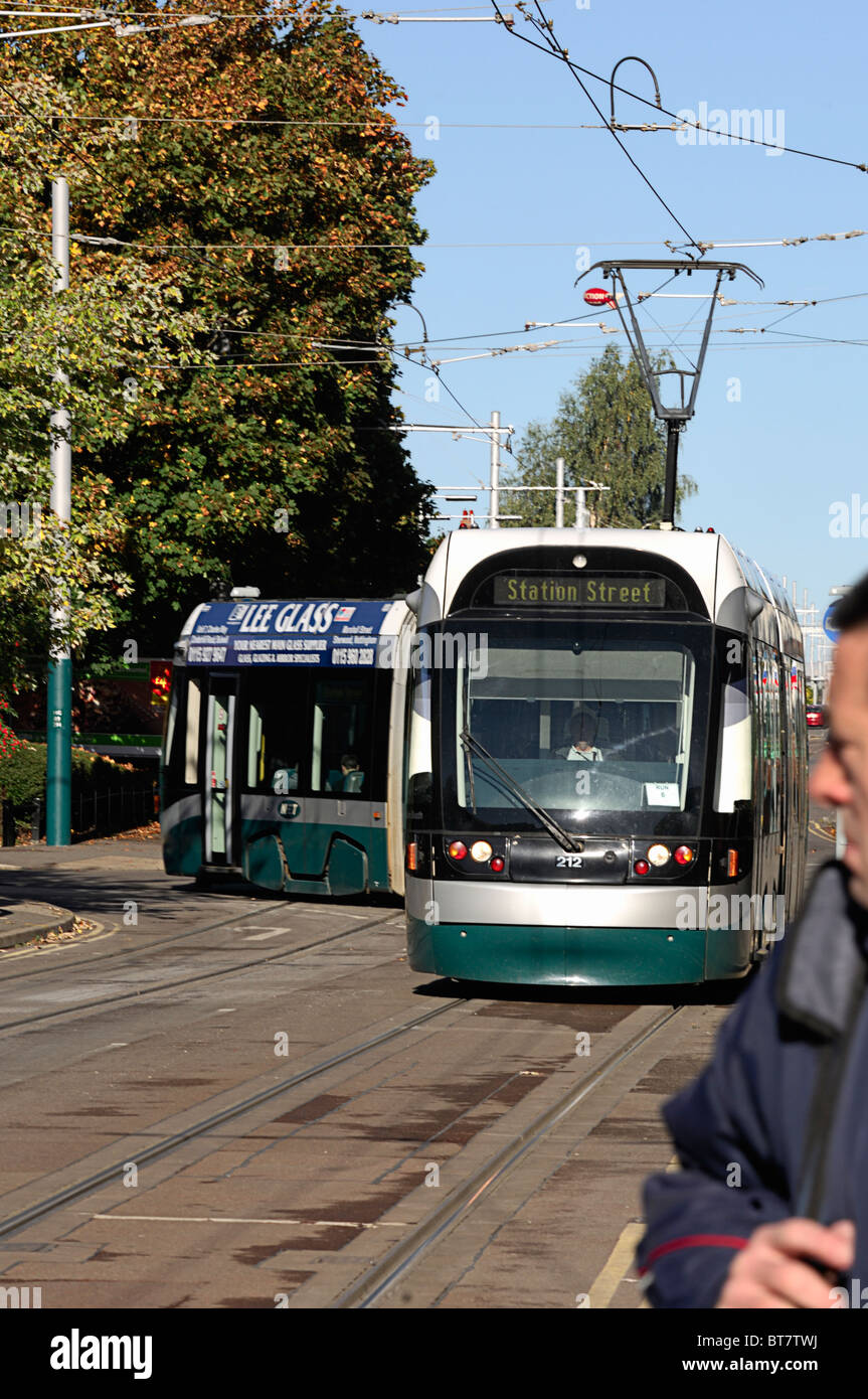 Running for the tram Stock Photo - Alamy