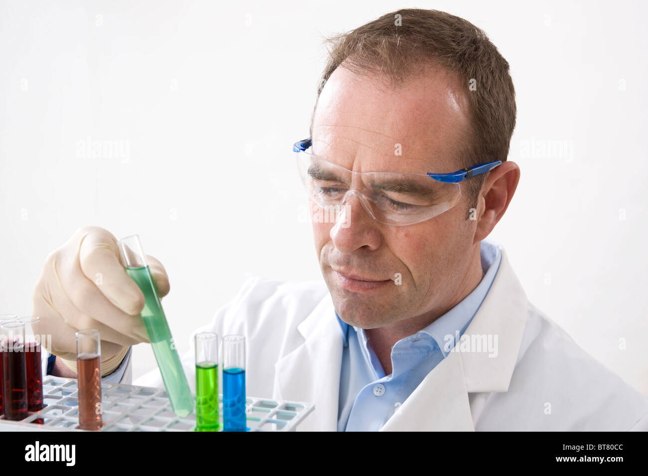 Man working on an experiment in a laboratory Stock Photo - Alamy