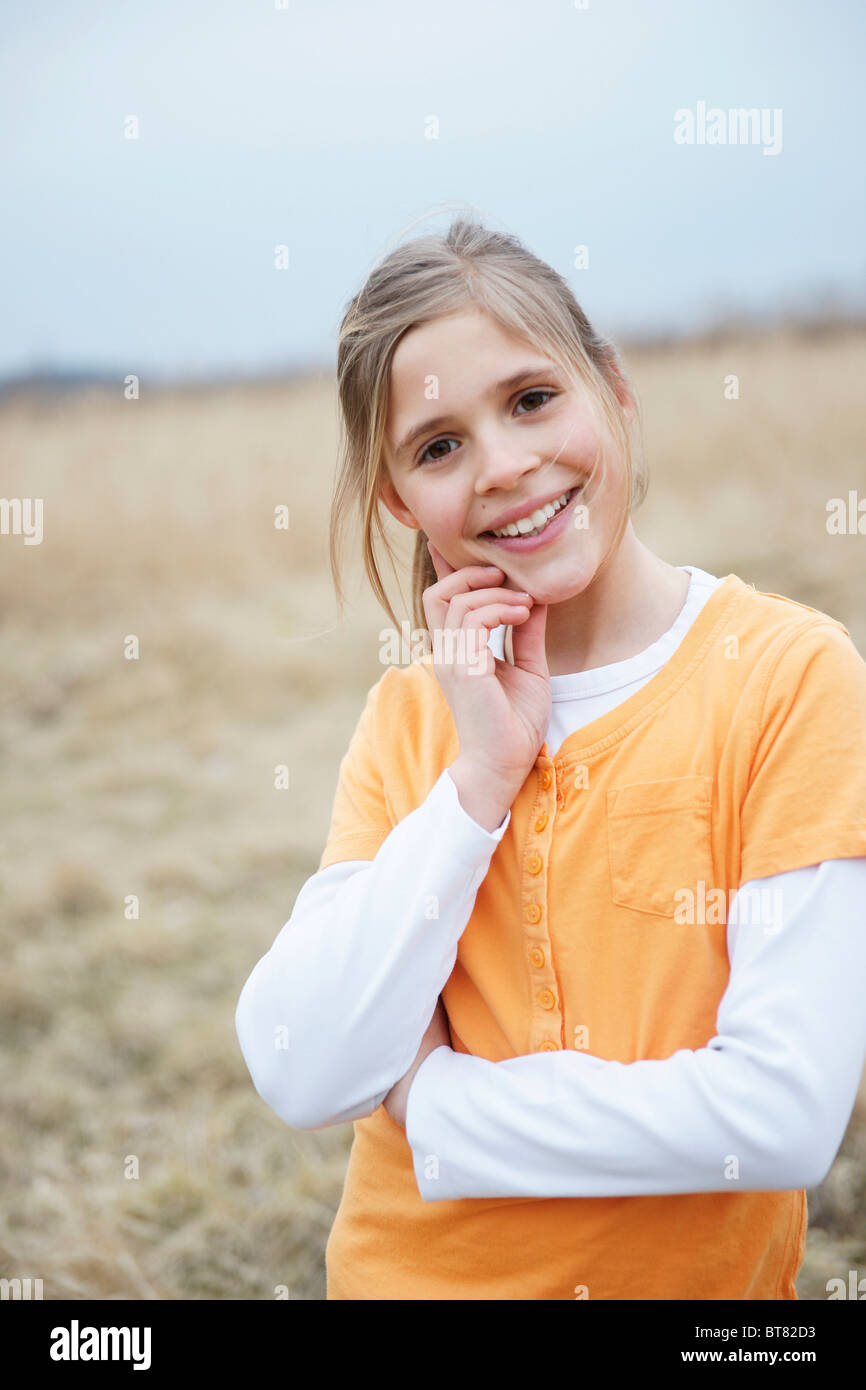 Portrait of a smiling blonde girl Stock Photo - Alamy