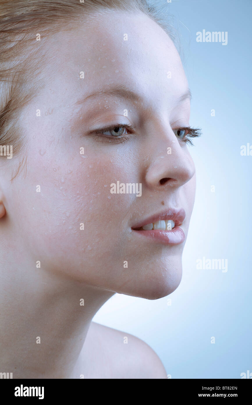 Young woman, waterdrops on her skin Stock Photo - Alamy