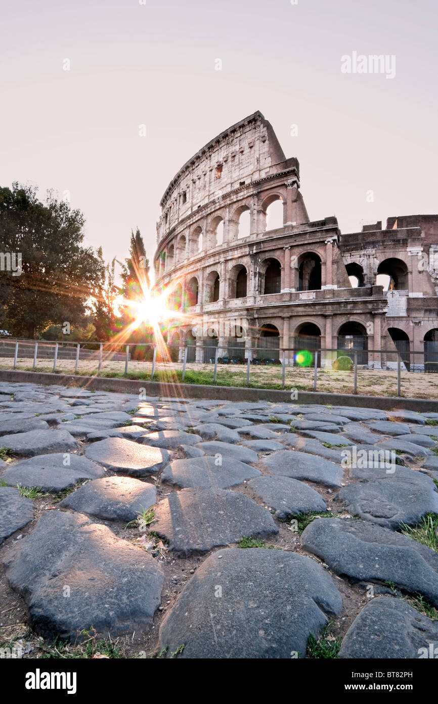 Colosseum and sacred way (Via Sacra) at sunrise, Rome Stock Photo - Alamy
