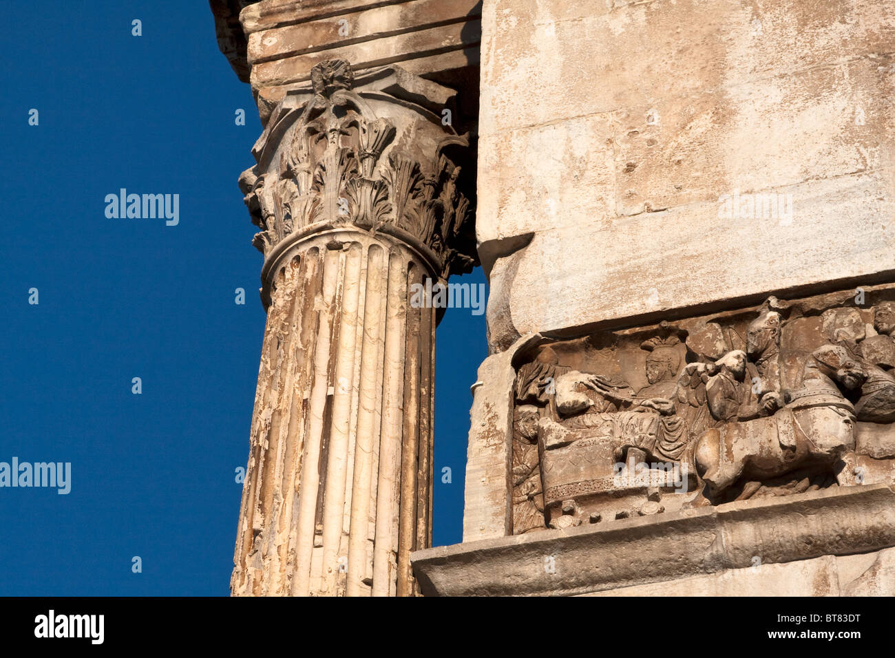 Particular, close up of a column with a Corinth capital Temple in Rome ...